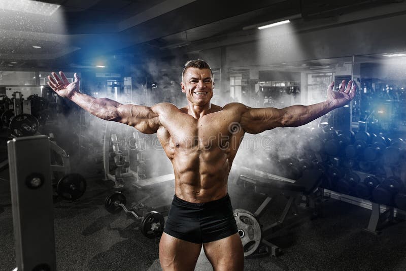 Portrait of a Handsome Muscular Bodybuilder Posing in Gym Stock Image ...