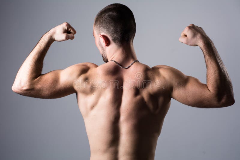 Handsome Muscular Young Man Taking Off Shirt Stock Image - Image of ...