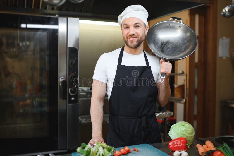 Portrait of Handsome Positive Chef Cook at the Restaurant Kitchen Stock ...
