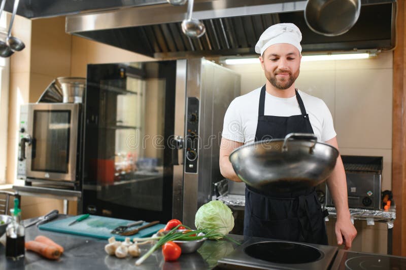 Portrait of Handsome Positive Chef Cook at the Restaurant Kitchen Stock ...