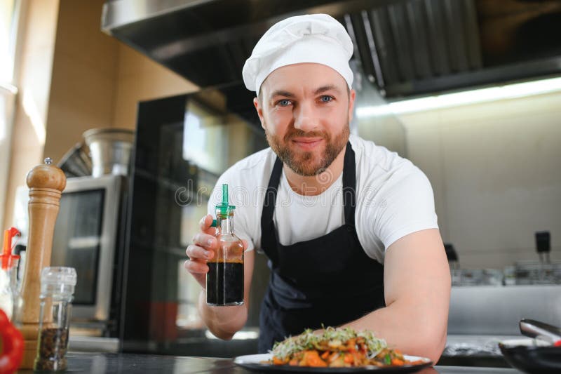 Portrait of Handsome Positive Chef Cook at the Restaurant Kitchen Stock ...