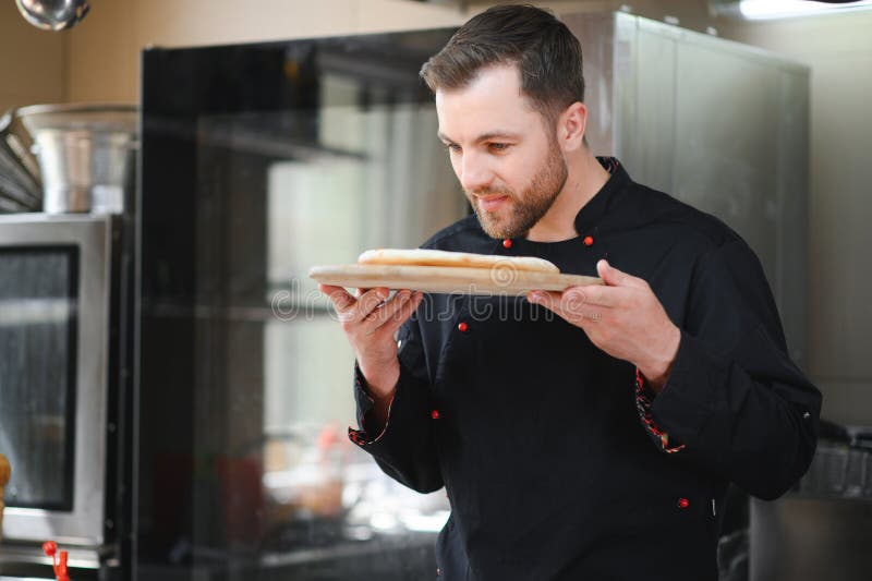 Portrait of Handsome Positive Chef Cook at the Restaurant Kitchen Stock ...