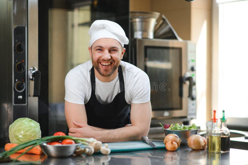 Portrait of Handsome Positive Chef Cook at the Restaurant Kitchen Stock ...