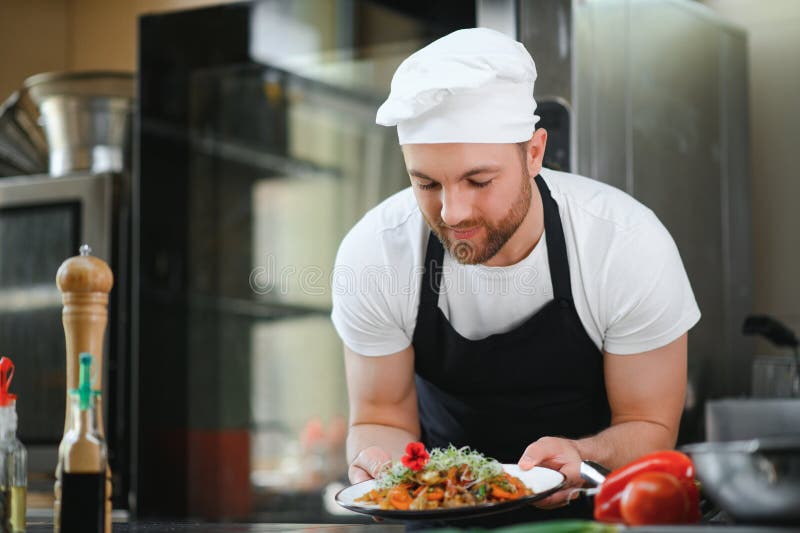Portrait of Handsome Positive Chef Cook at the Restaurant Kitchen Stock ...
