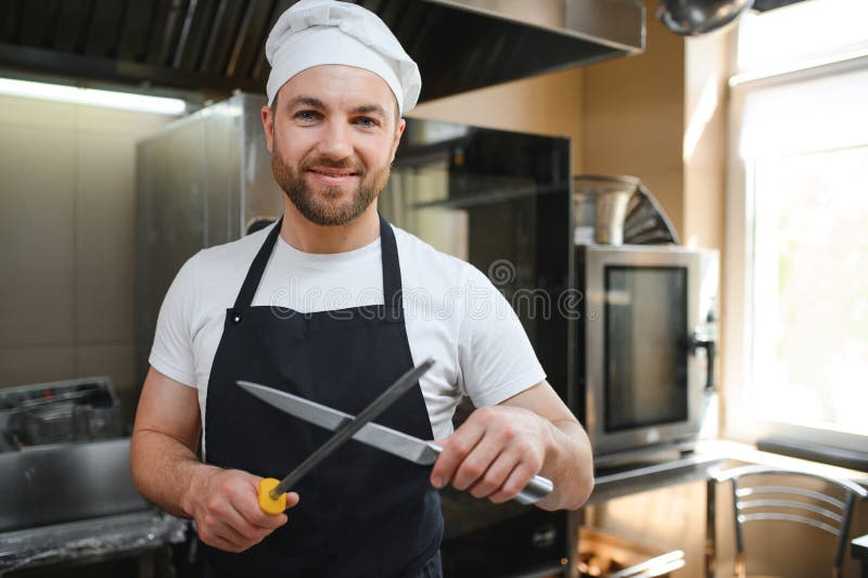 Portrait of Handsome Positive Chef Cook at the Restaurant Kitchen Stock ...