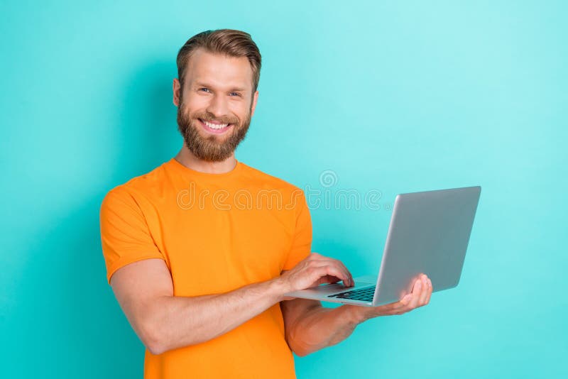 Portrait Of Handsome Positive Glad Guy With Blond Hairdo Wear Orange T
