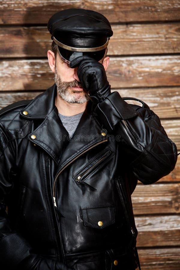 Handsome Bearded Man Dressed in Black Leather Stock Image - Image of ...