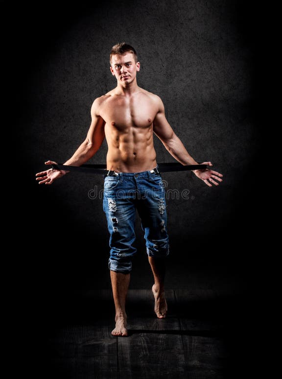 Portrait of a Handsome Well-built Man Stock Photo - Image of young ...