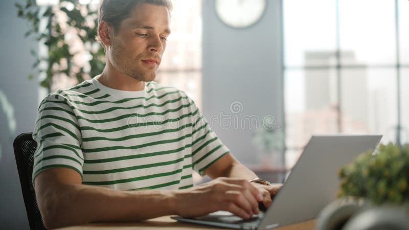 Portrait of Handsome White Man Doing Remote Online Work on Laptop ...