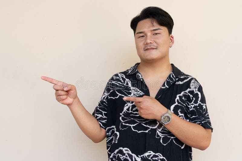 Portrait of Handsome Young Asian Man Against Plain Background Stock ...