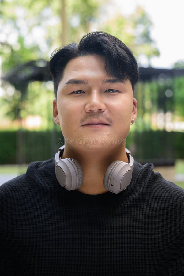 Portrait of Handsome Young Asian Man Outdoors in Park Stock Image ...