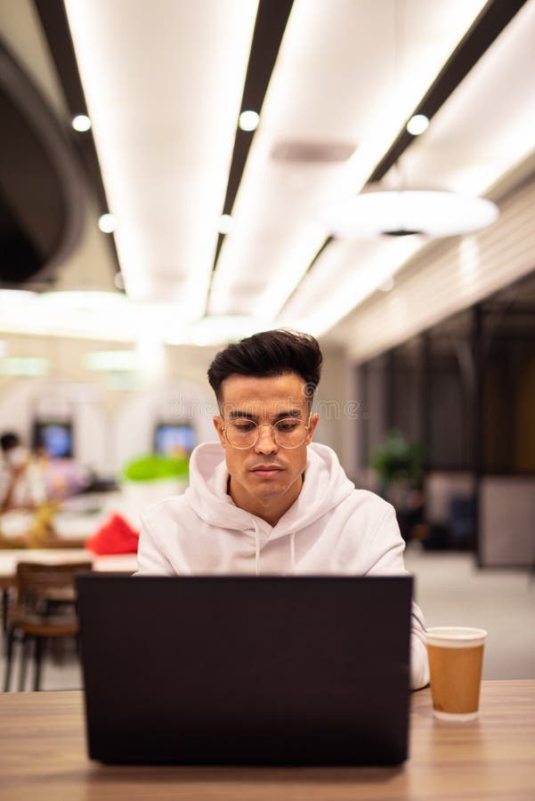 Portrait of Handsome Young Cool Man Using Laptop at Coffee Shop Stock ...