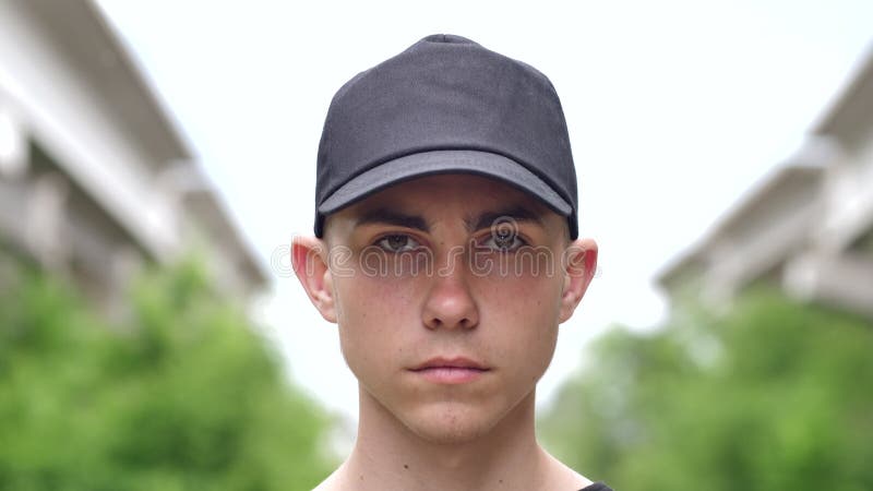 Portrait of a Handsome Young Guy in a Cap. Lifestyle Concept Stock ...