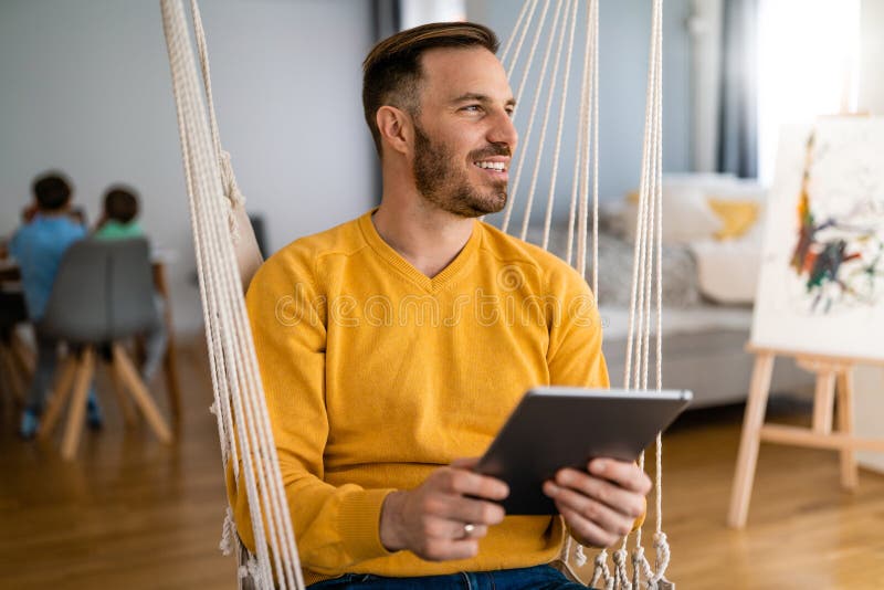 Portrait of Handsome Young Happy Man Using Digital Tablet Stock Photo ...