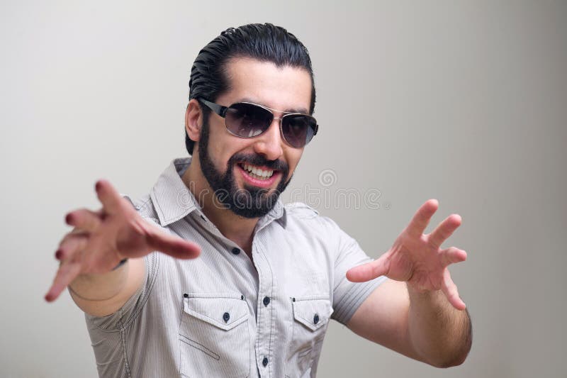 Portrait of a Handsome Young Man Doing Hand Gestures and Smiling Stock ...