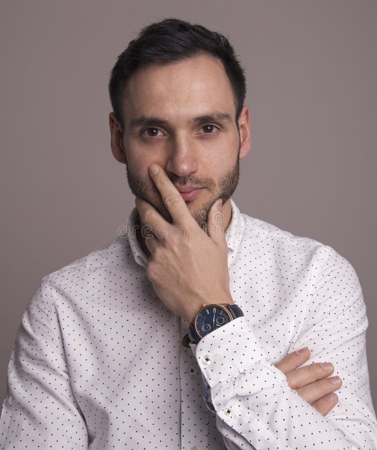 Portrait of a Handsome Young Man. Elegant Pose with White Dots Shirt ...