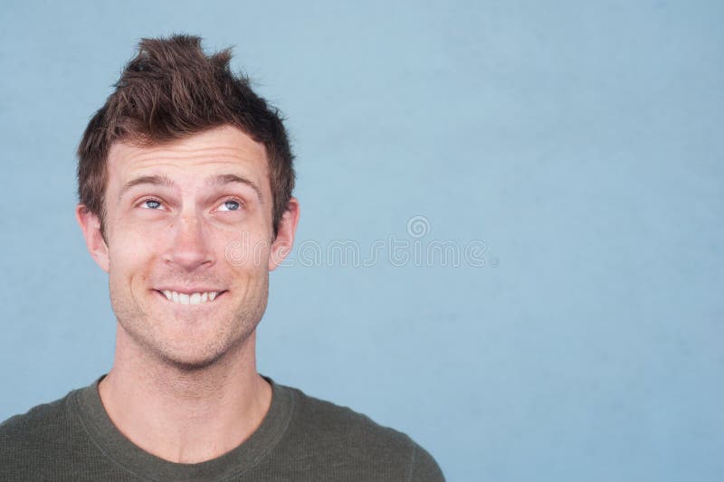 Portrait of a Handsome Young Man Looking Up Stock Photo - Image of ...