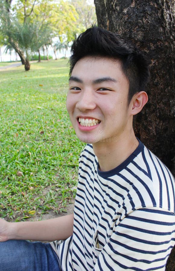 Portrait of a Handsome Young Man Posing Outdoor. Stock Image - Image of ...