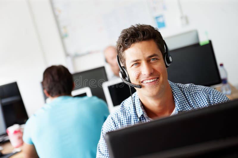 Hes Happy To Be of Service. Portrait of a Handsome Young Sales ...