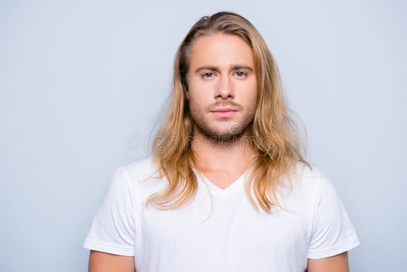 Portrait Of Handsome Young Serious Confident Young Guy With Blonde Long