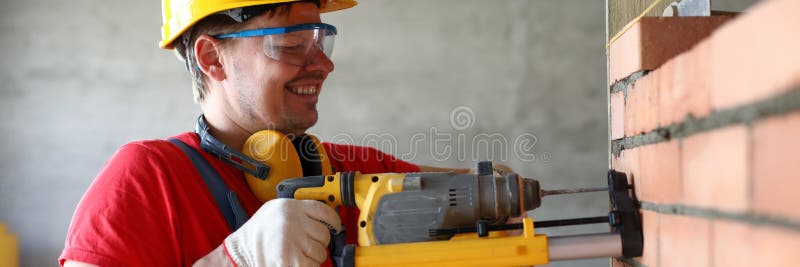 Builder Drilling Hole in Wall, Construction Site Stock Photo - Image of ...