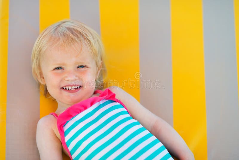 Portrait of Happy Baby Laying on Sun Bed Stock Photo - Image of suntan ...