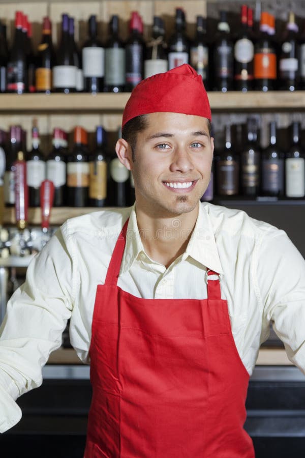 Portrait of Bartender with Cashier at Counter in Restaurant Stock Image ...