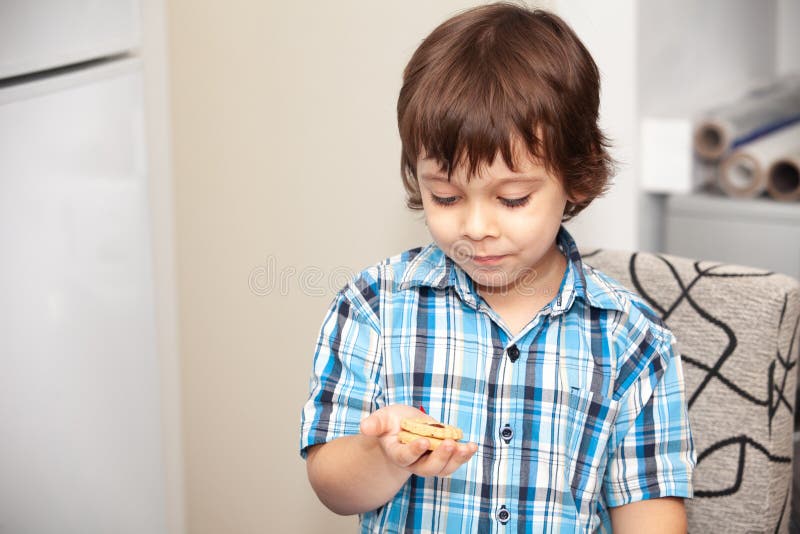 Portrait Happy Boy Eating Cookies Stock Image - Image of elated, happy ...