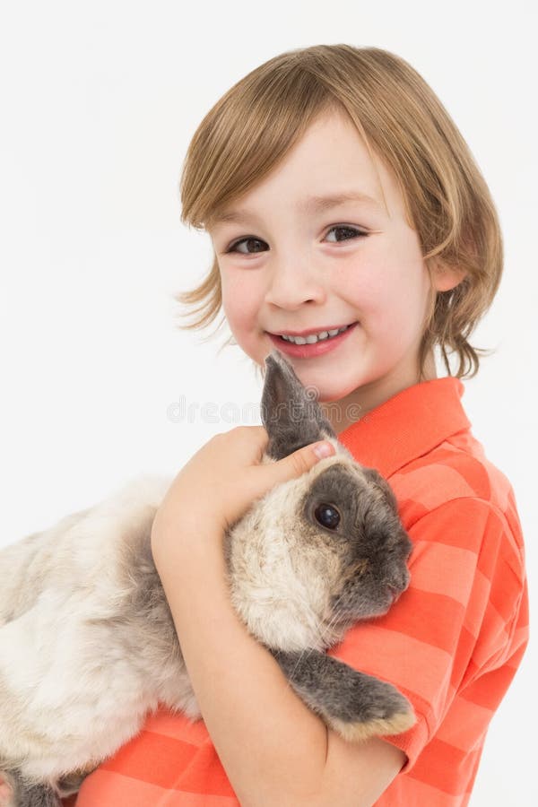 Portrait of Happy Boy Holding Fluffy Rabbit Stock Image - Image of ...