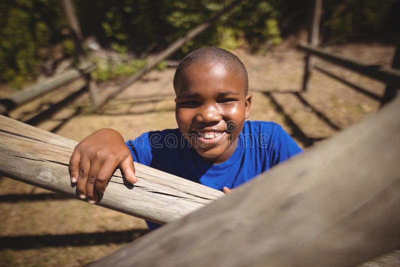 Portrait of Happy Boy Standing in Boot Camp Stock Image - Image of ...