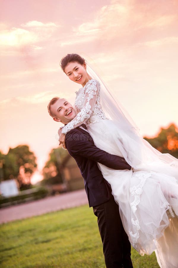 Carrying the bride. stock photo. Image of suitor, married - 10643210