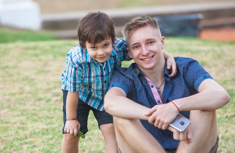 Brothers in the Park stock photo. Image of smile, attractive - 28604124