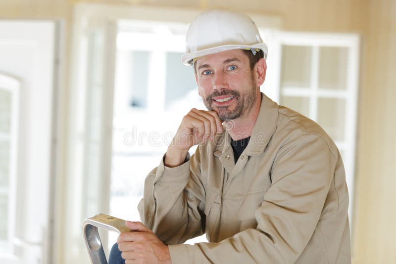 Portrait Happy Builder on Ladder Stock Photo - Image of rubber ...