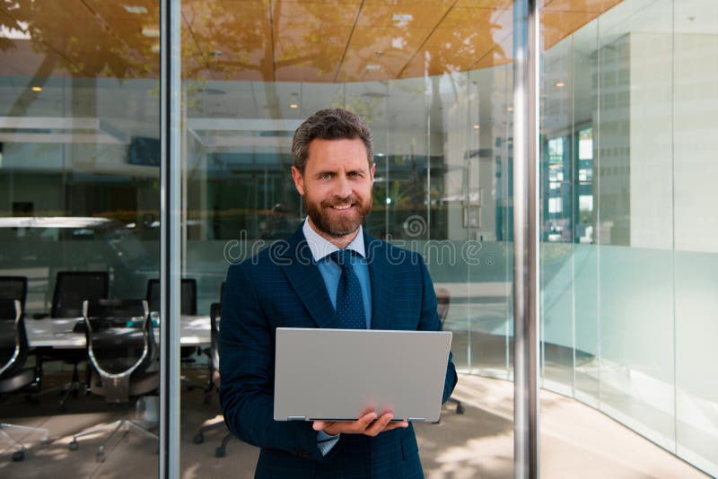 Portrait of Happy Businessman in Front of Modern Office. Stock Photo ...