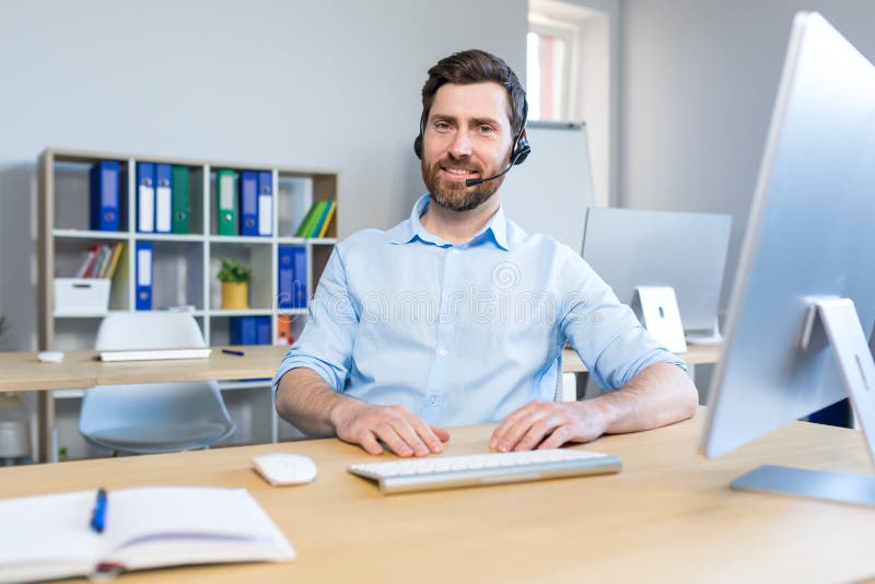 Portrait of a Happy Businessman, Man Working Remotely, Using a Headset ...