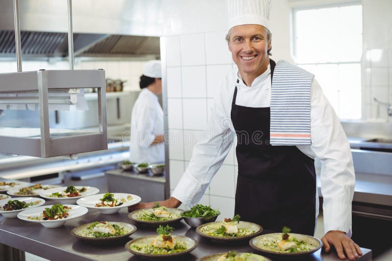 Portrait of Happy Chef with Appetizer Plates at Order Station Stock ...