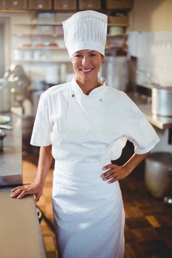 Portrait of Happy Chef Standing with Hand on Hip Stock Photo - Image of ...