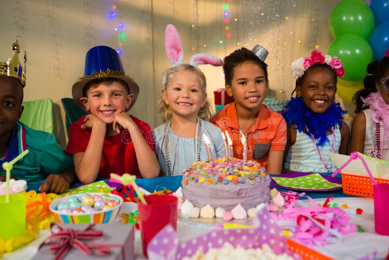 Portrait of Happy Children at Table Stock Photo - Image of indoors ...
