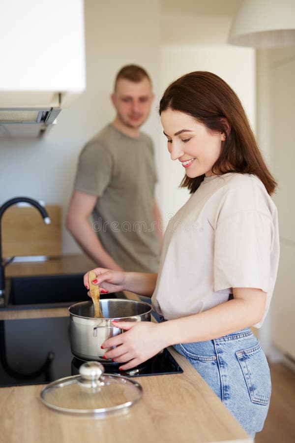 Portrait of Happy Couple Cooking in Modern Kitchen Stock Image - Image ...