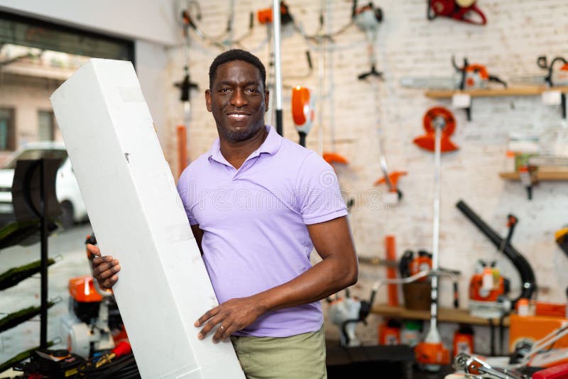 Portrait of Happy Customer with Box at Garden Tools Store Stock Image ...