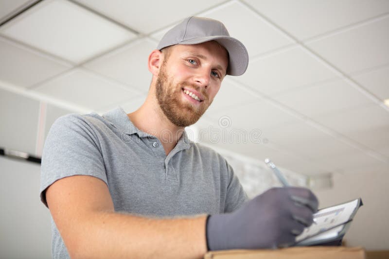 Portrait Happy Delivery Man with Cardboard Box and Clipboard Stock ...