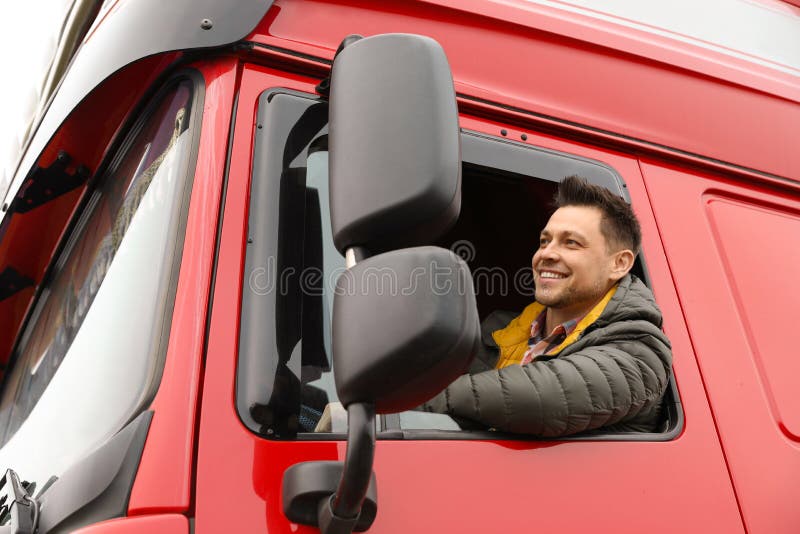 Portrait of Happy Driver in Cab of Truck Stock Image - Image of ...