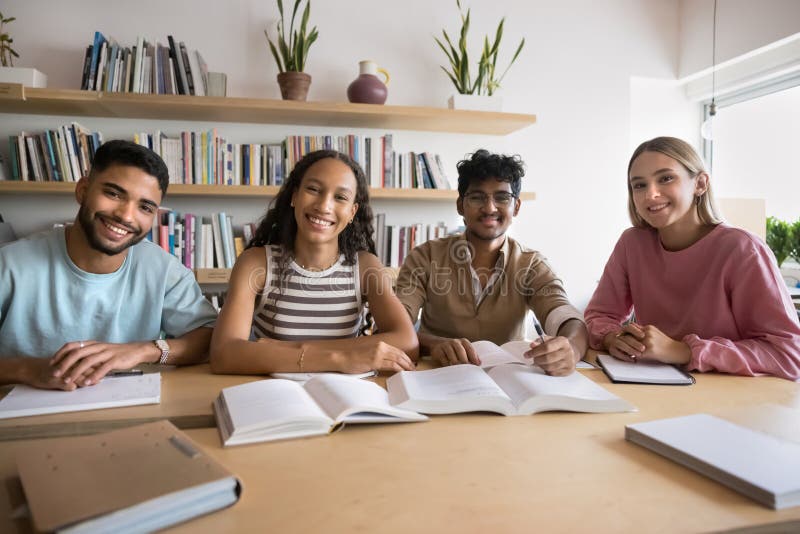 Portrait of Happy Excellent Students Studying Together in Library Stock ...
