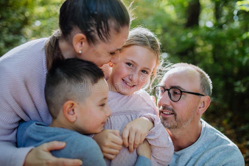 Portrait of Happy Family with Kids in a Forest. Stock Photo - Image of ...
