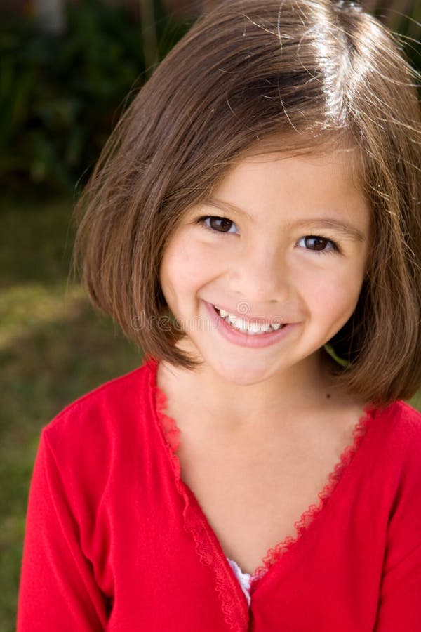 Portrait of a Happy Hispanic Little Girl Smiling. Stock Photo - Image ... Portrait of a Happy Hispanic Little Girl Smiling. Stock Photo - Image ...