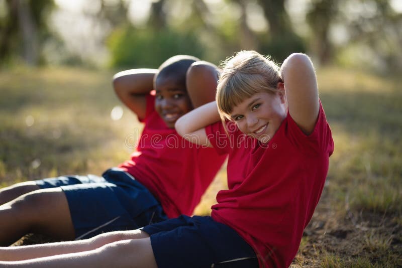 Portrait of Happy Kids Exercising during Obstacle Course Stock Image ...