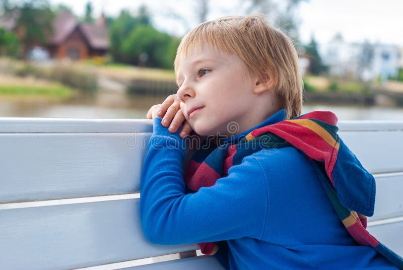 Portrait of a Happy Little Boy on a Bench Stock Image - Image of snack ...