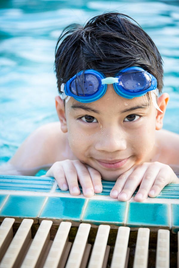 Portrait of Happy Little Boy Playing in the Pool Stock Photo - Image of ...