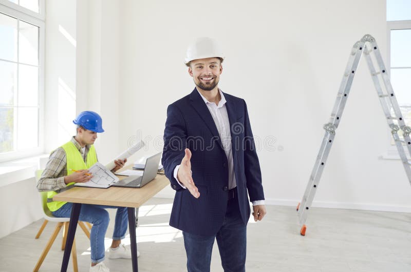 Happy Businessman, Architect, or Constructor Offering Handshake Stock ...