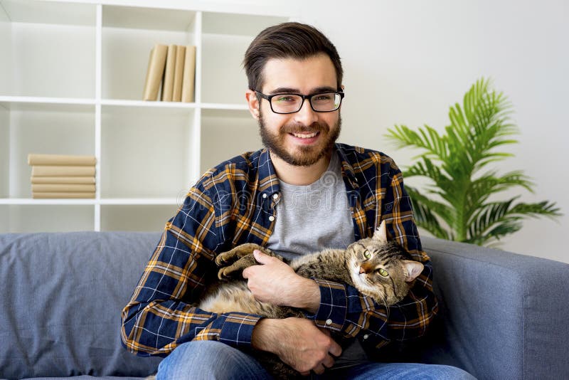 Man with a cat stock image. Image of feelings, girl, animal - 99214333